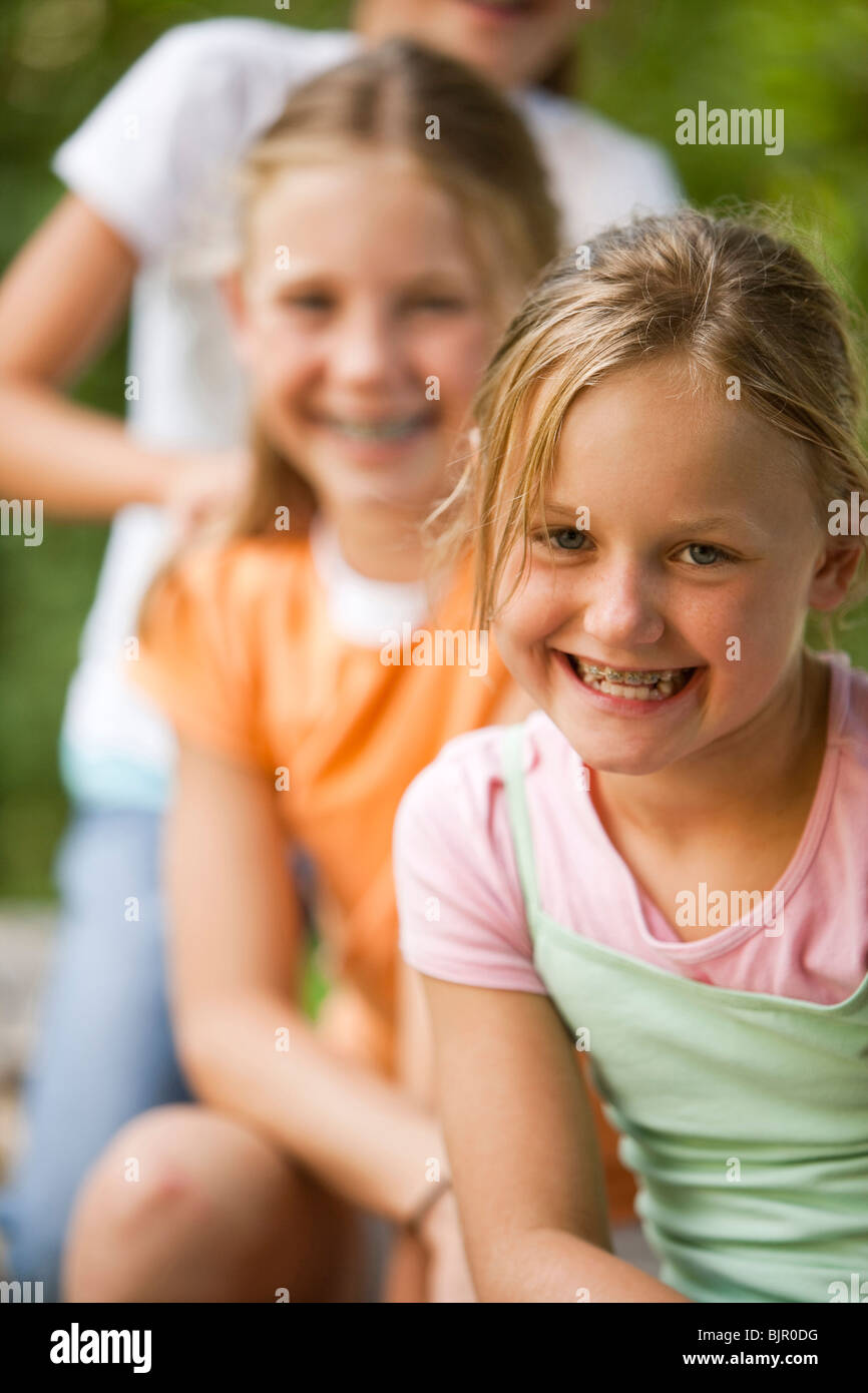 Three girl friends outside Stock Photo - Alamy