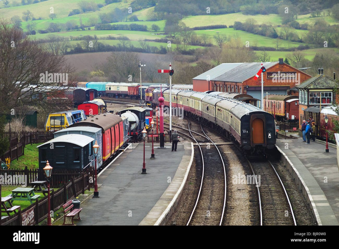 A station on a railway line in the countryside Stock Photo - Alamy