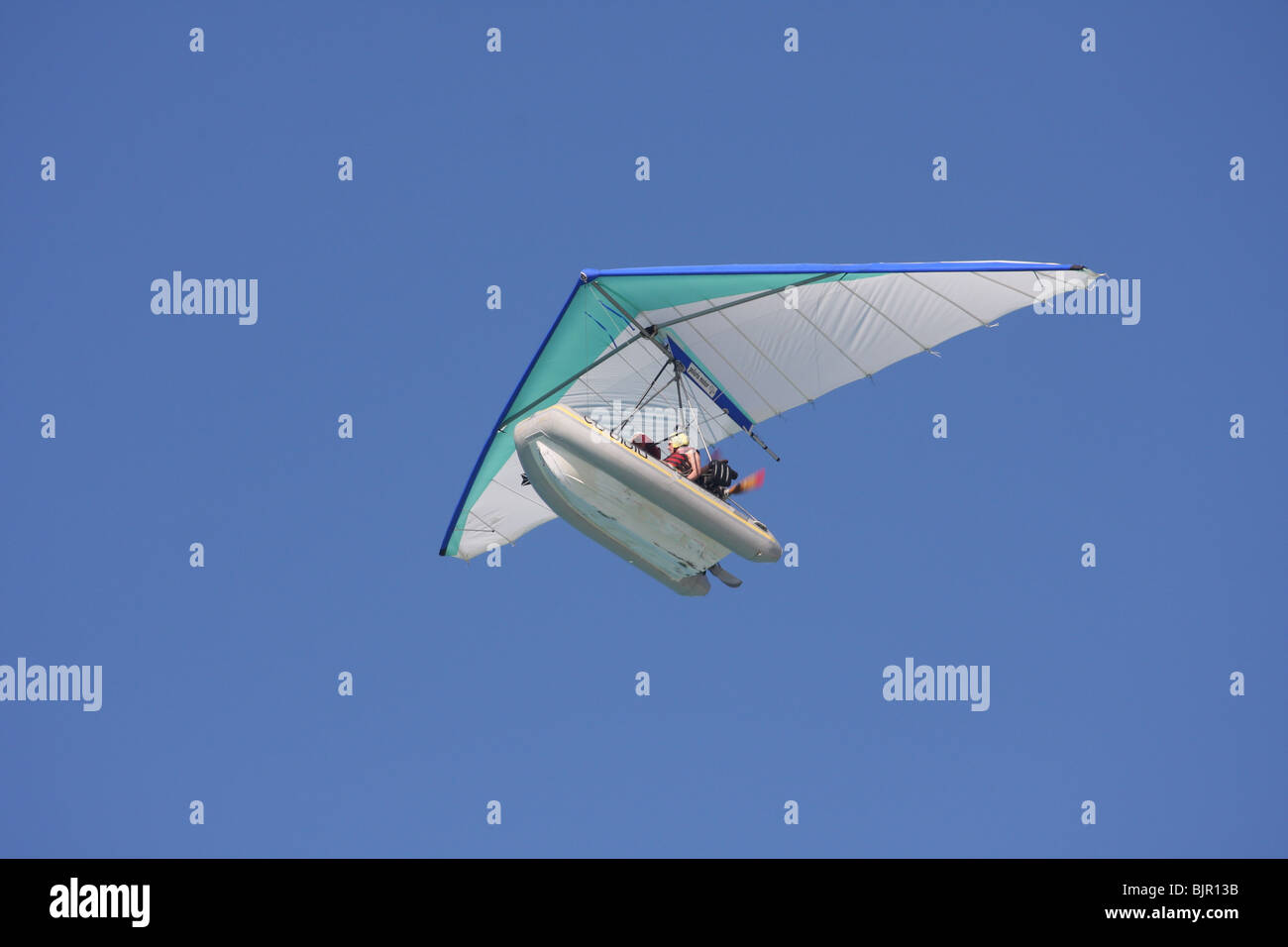 Microlight aircraft flies tourists above hi-res stock photography and ...