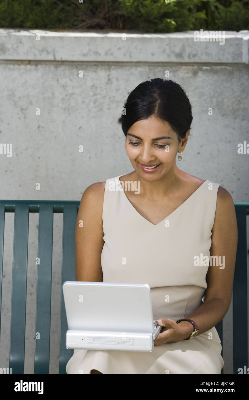 Woman on laptop Stock Photo - Alamy