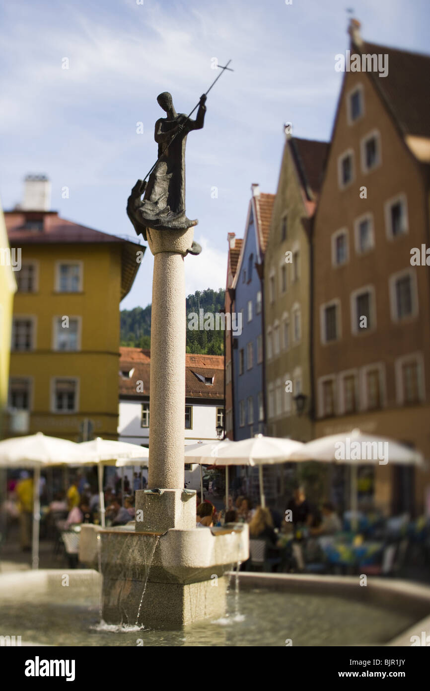 Men biking down street Stock Photo - Alamy