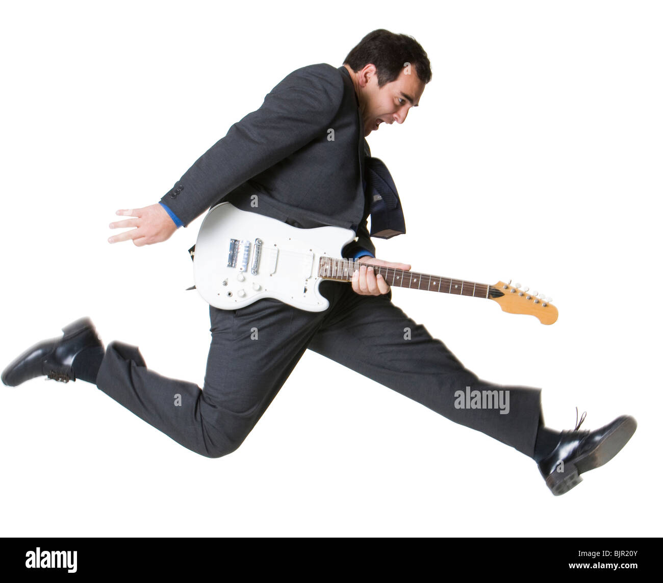 Excited businessman jumping holding hi-res stock photography and images ...