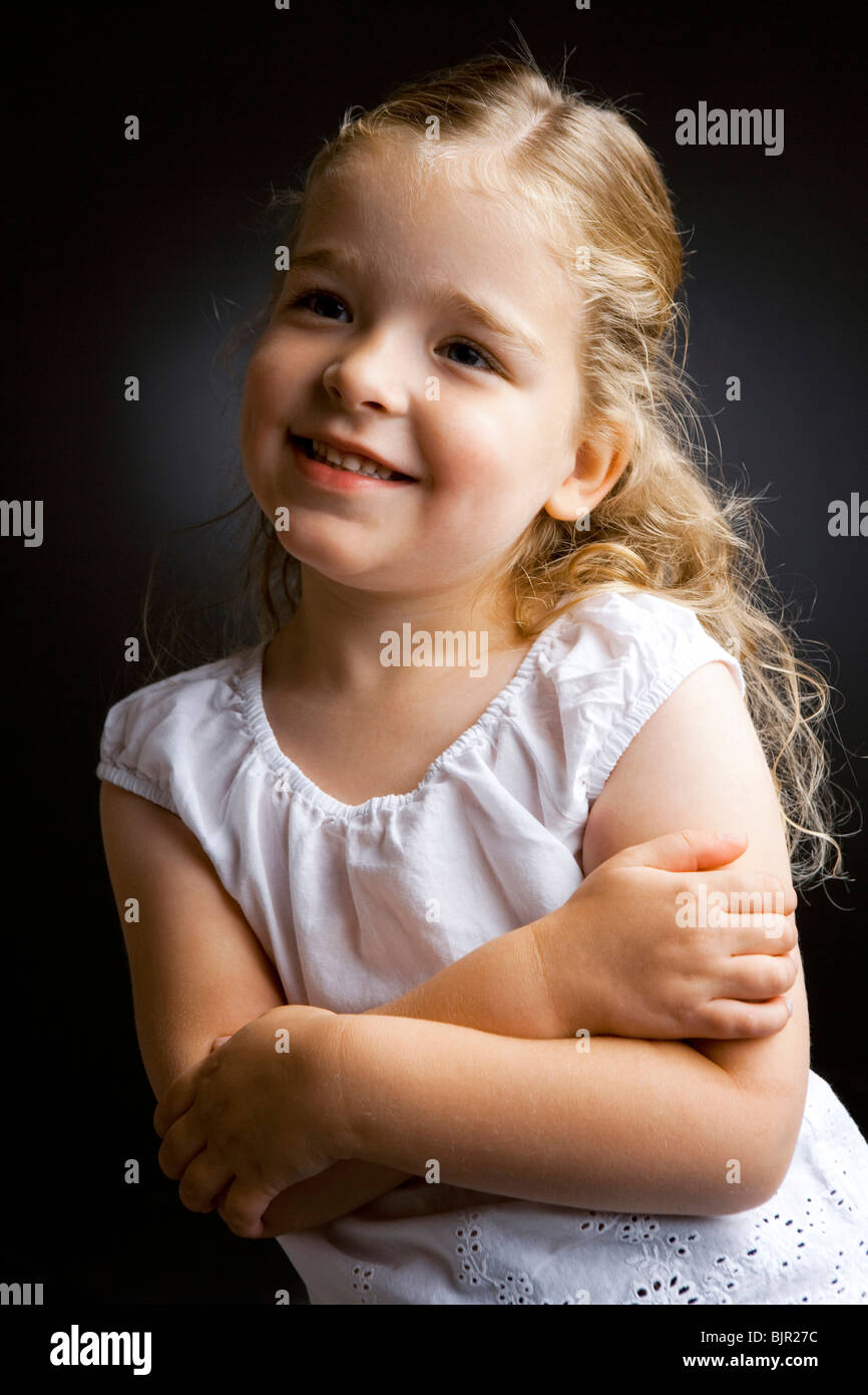 Child 5 6 crossed arms hi-res stock photography and images - Alamy