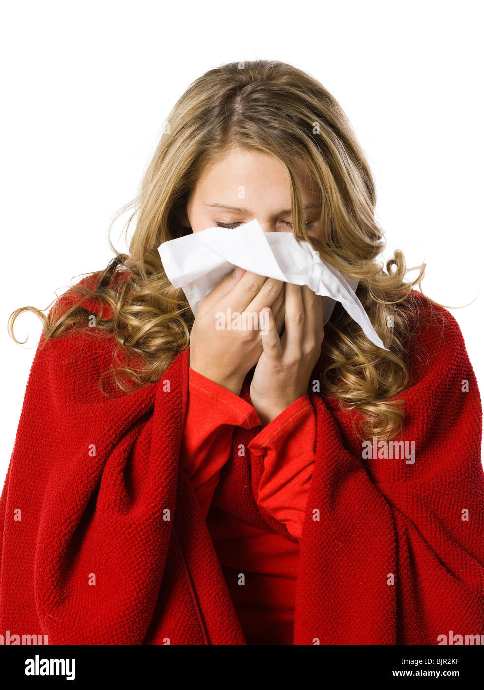 young woman sneezing Stock Photo - Alamy