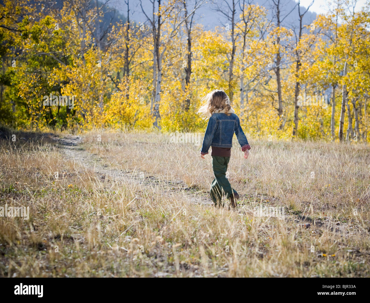 girl walking outside Stock Photo - Alamy