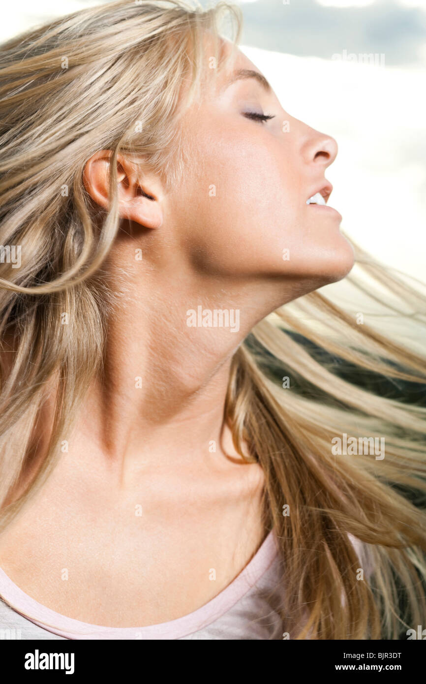 Woman moving head side to side Stock Photo - Alamy