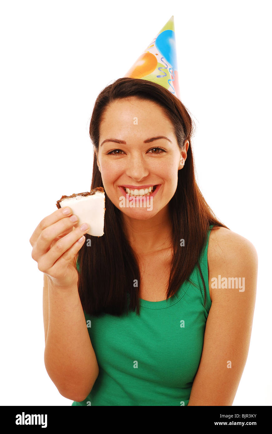 Woman eating cake at a party Stock Photo - Alamy