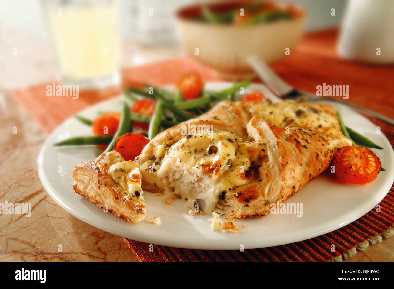 chicken in pastry food photos Stock Photo - Alamy