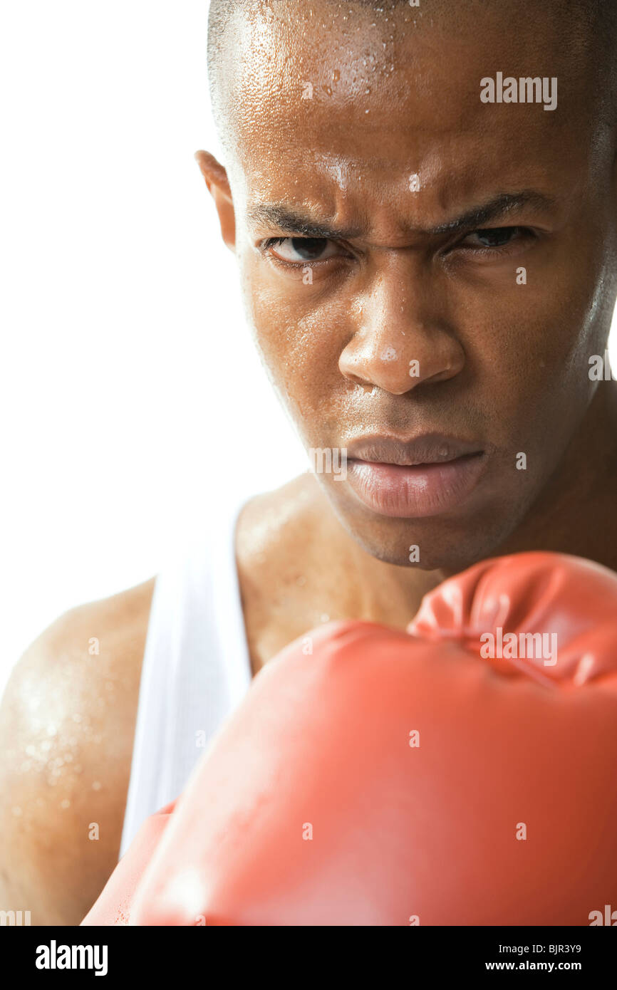 Man wearing boxing gloves Stock Photo - Alamy