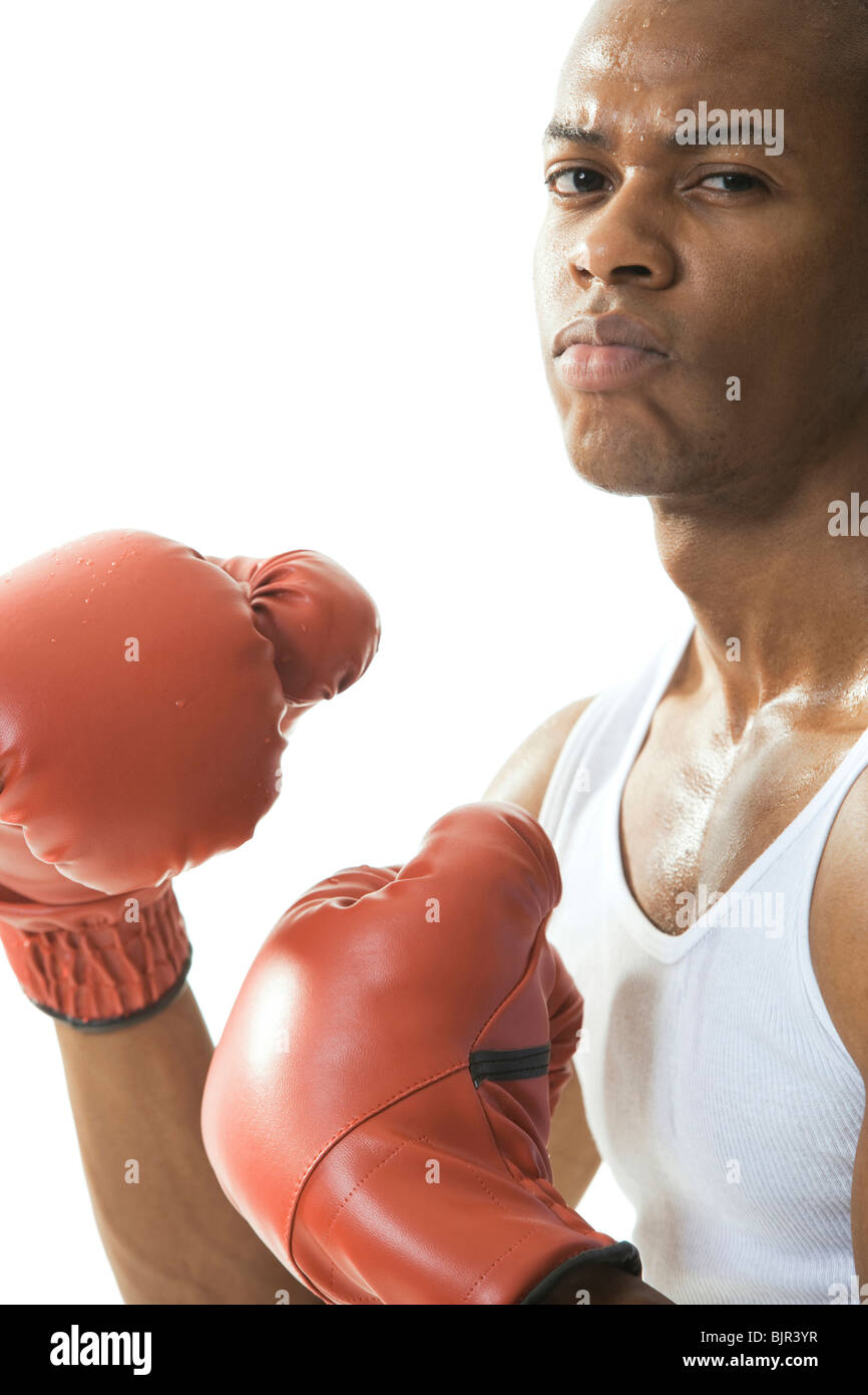 Man wearing boxing gloves Stock Photo - Alamy
