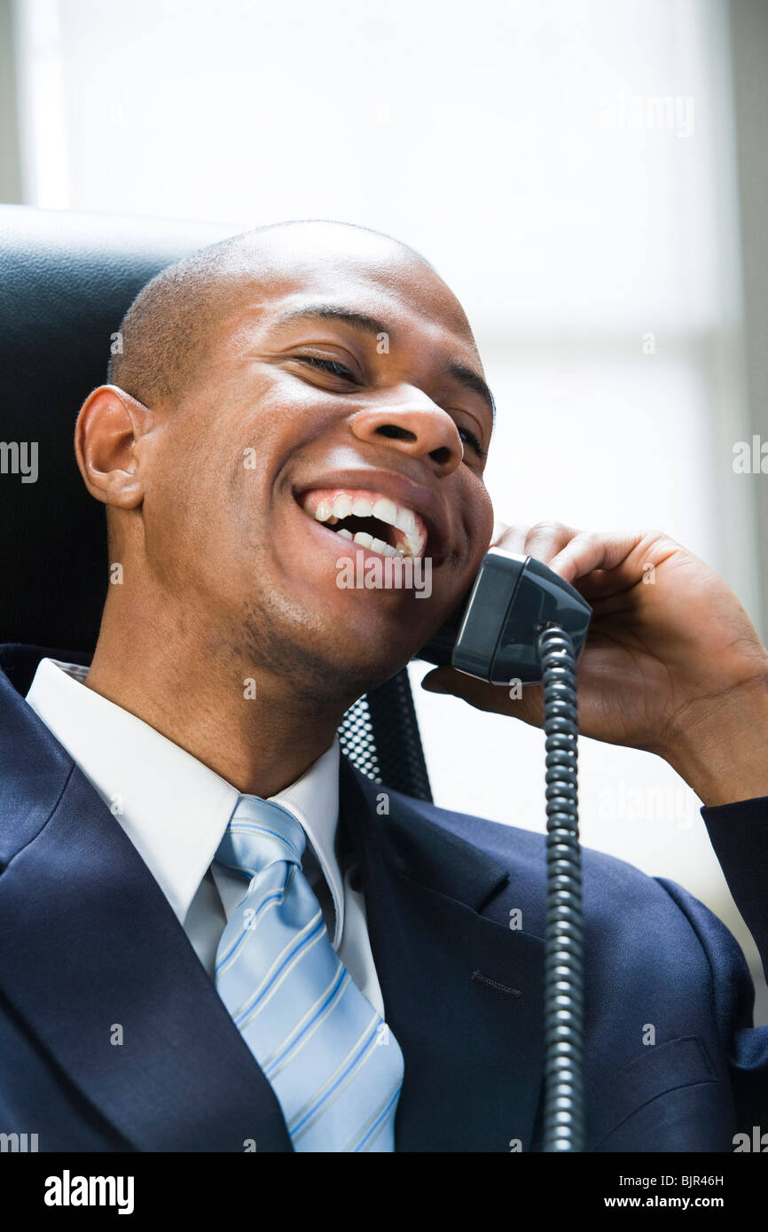 African businessman holding receiver hi-res stock photography and ...