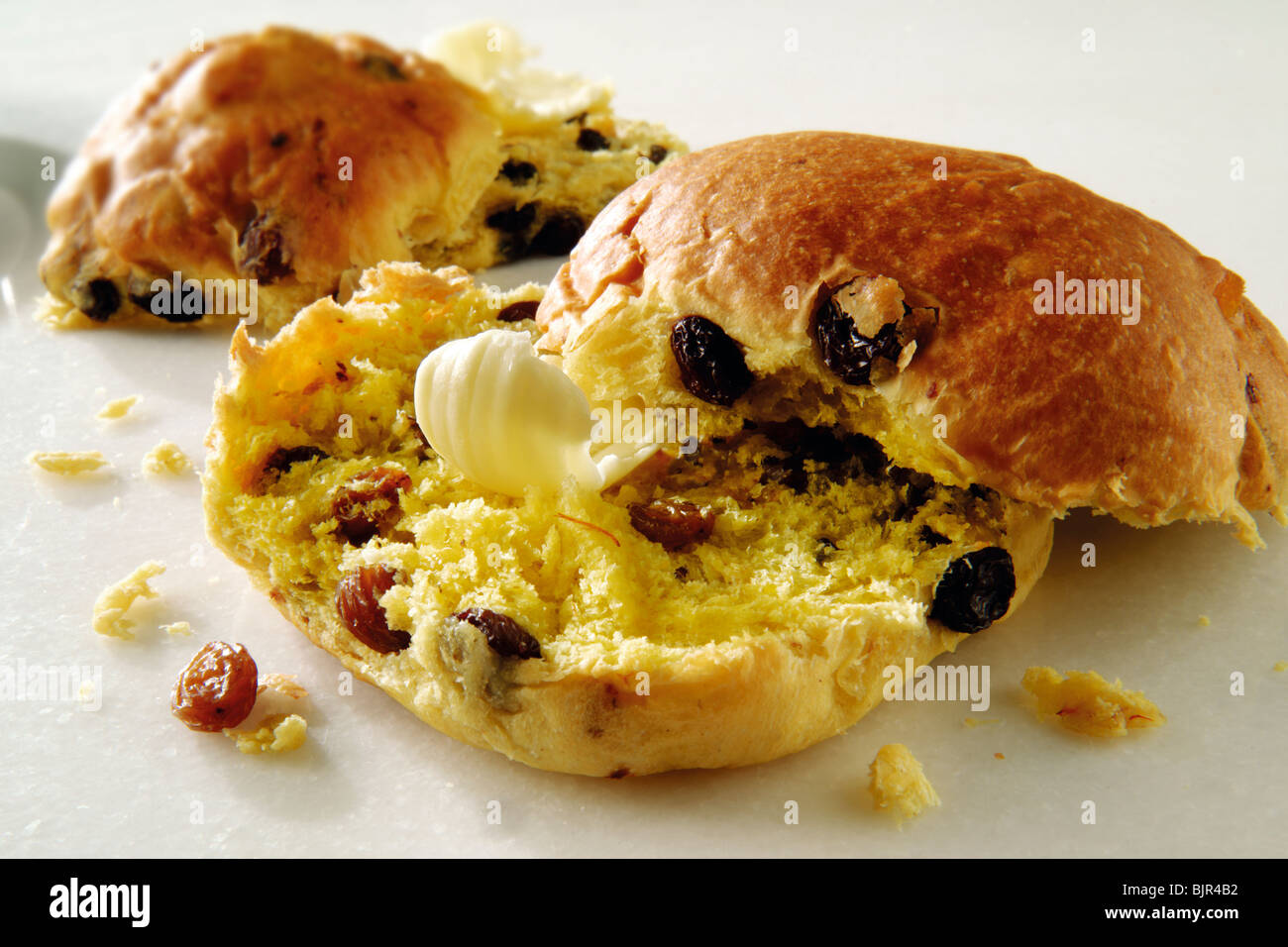 Traditional Cornish saffron bun with butter Stock Photo - Alamy