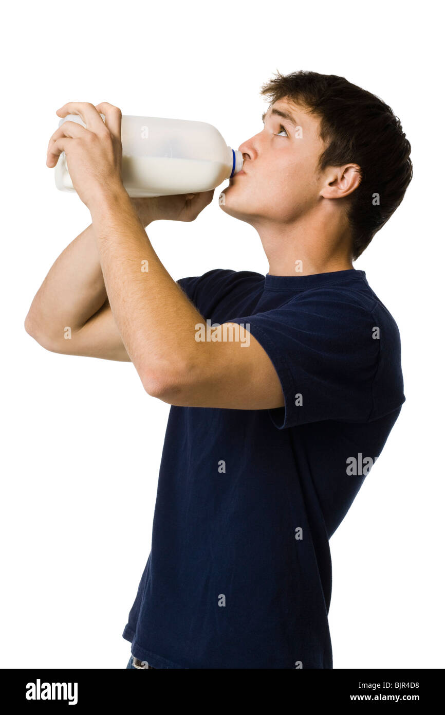 young man drinking milk Stock Photo - Alamy