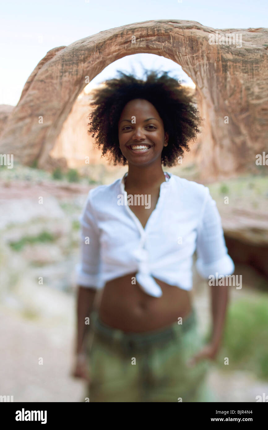 Woman outside smiling Stock Photo - Alamy