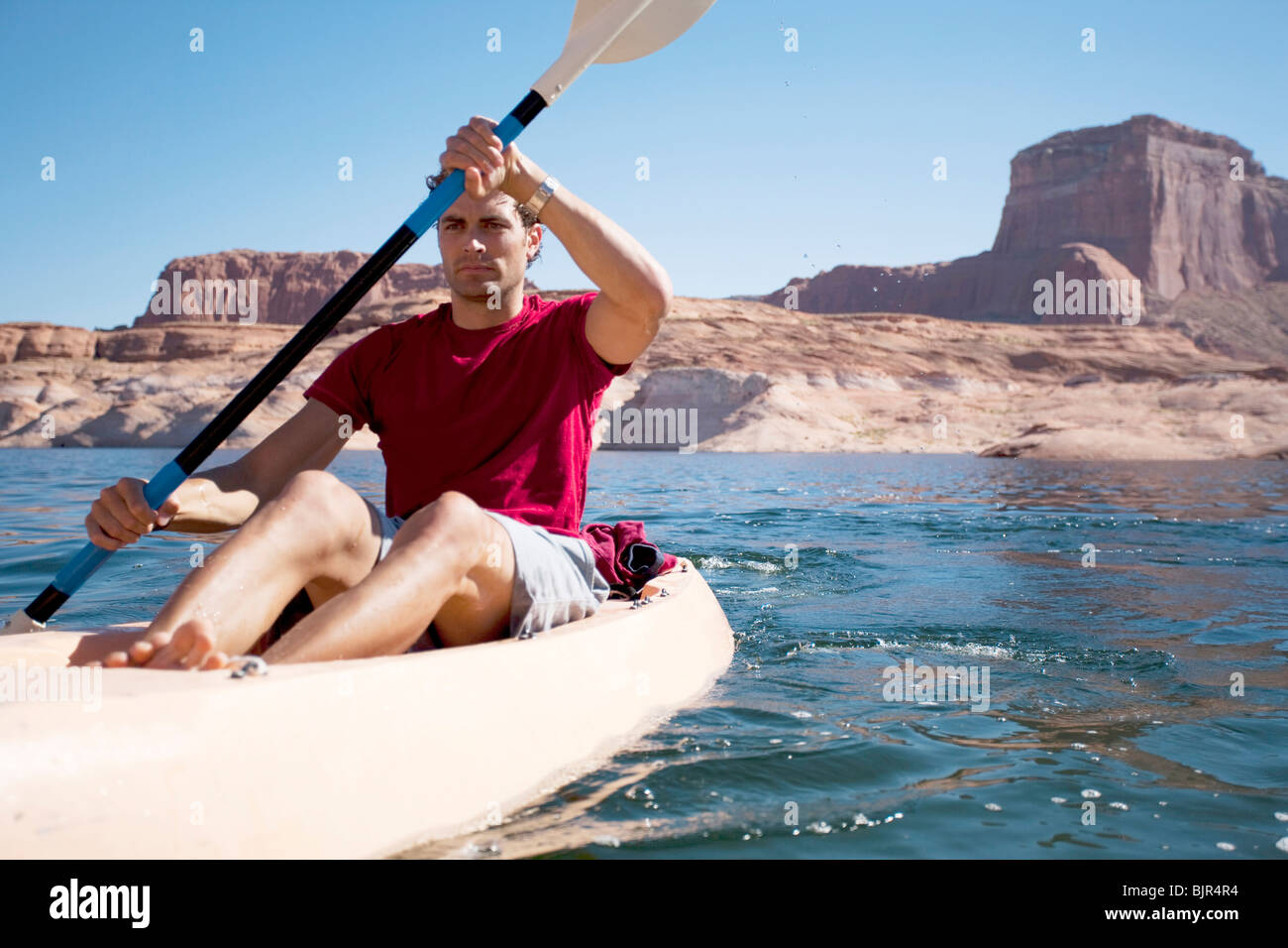 Canoes males rowing canoes hi-res stock photography and images - Alamy