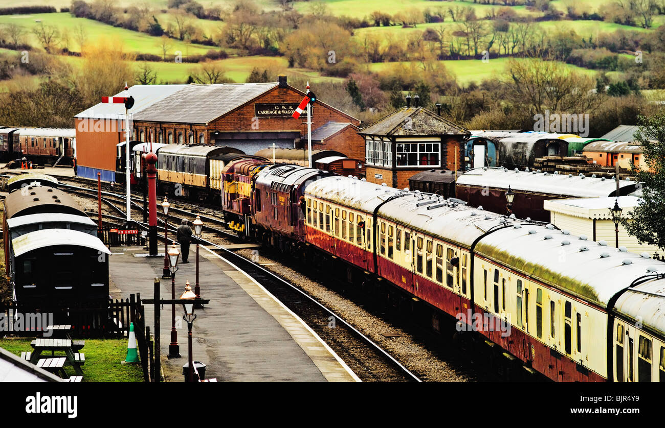 A station on a railway line in the countryside Stock Photo - Alamy