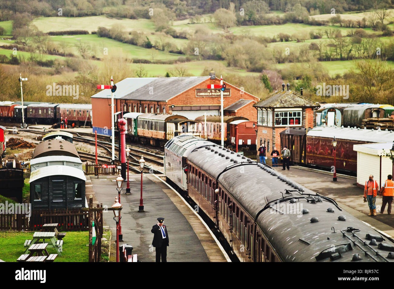 A station on a railway line in the countryside Stock Photo - Alamy