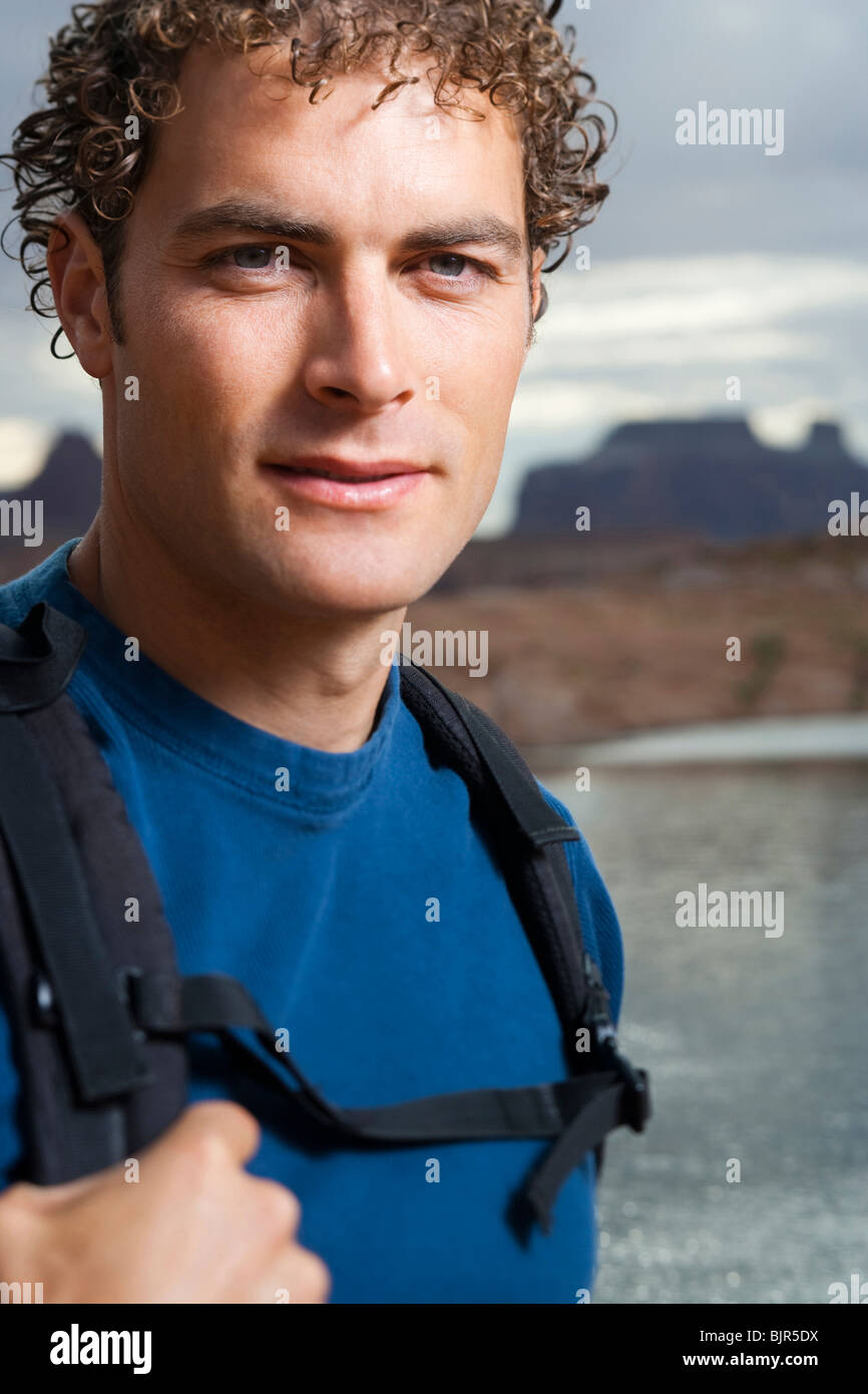 Man with backpack Stock Photo - Alamy