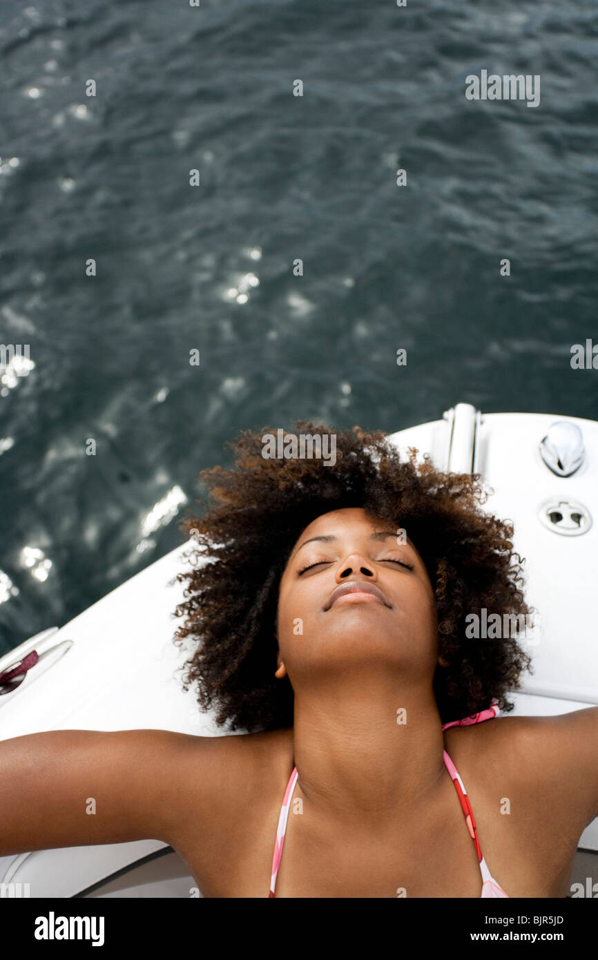 Woman in bikini on boat Stock Photo - Alamy
