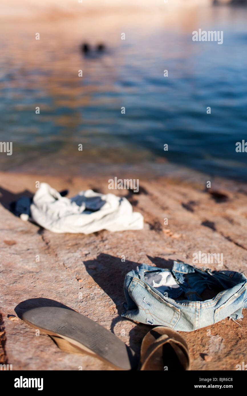 Clothing on ground Stock Photo - Alamy