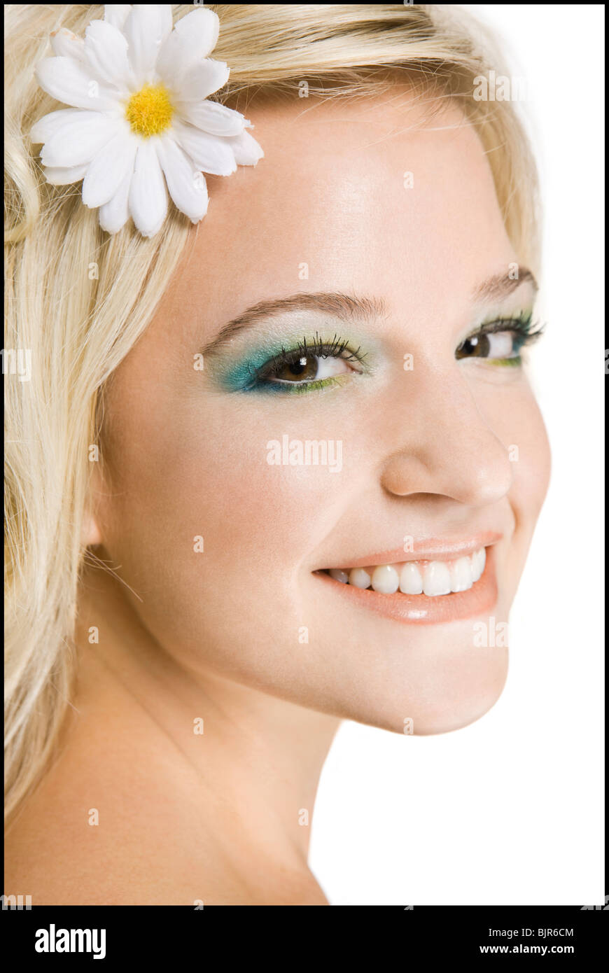 woman with a daisy in her hair Stock Photo - Alamy
