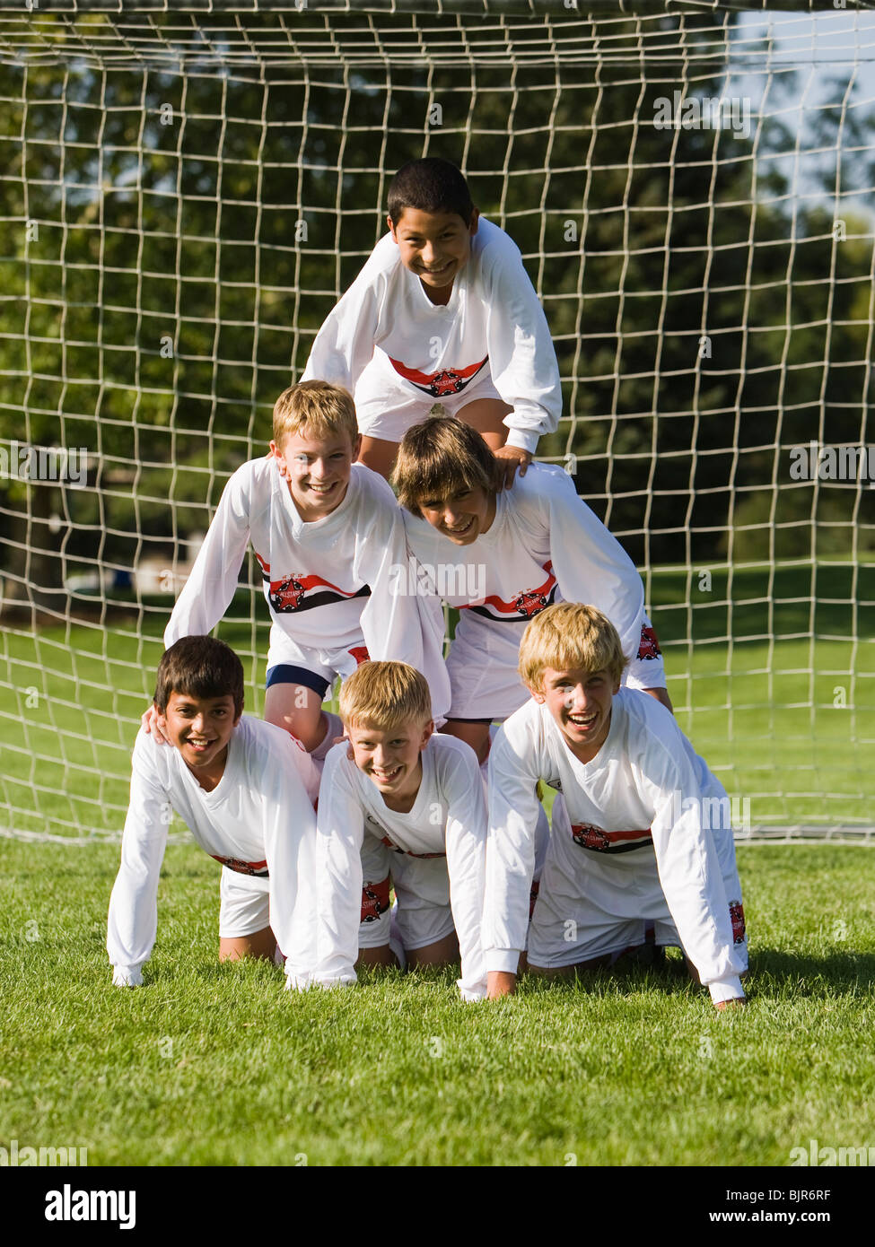 Human pyramid hi-res stock photography and images - Alamy