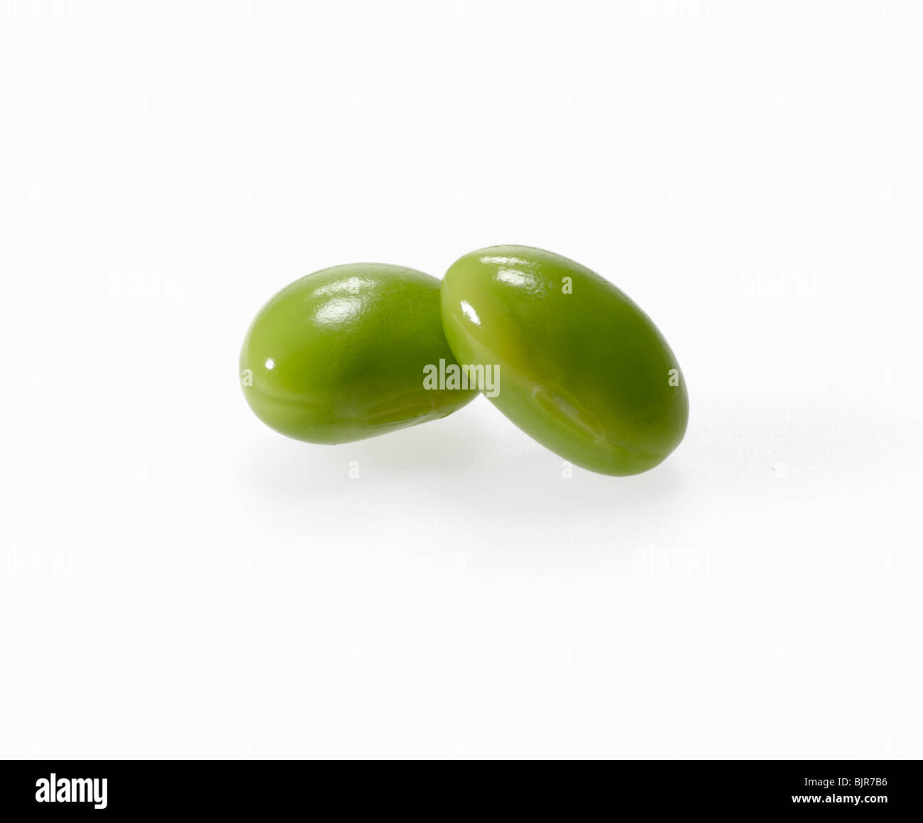soy bean pod cut out on white background Stock Photo - Alamy