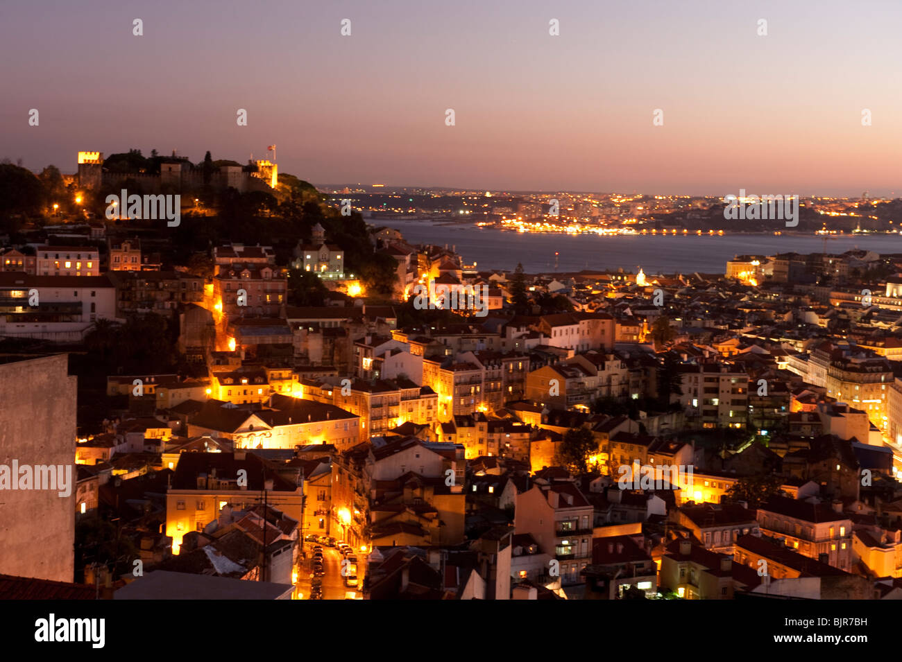 This is an image of Lisbon, Portugal at night Stock Photo - Alamy