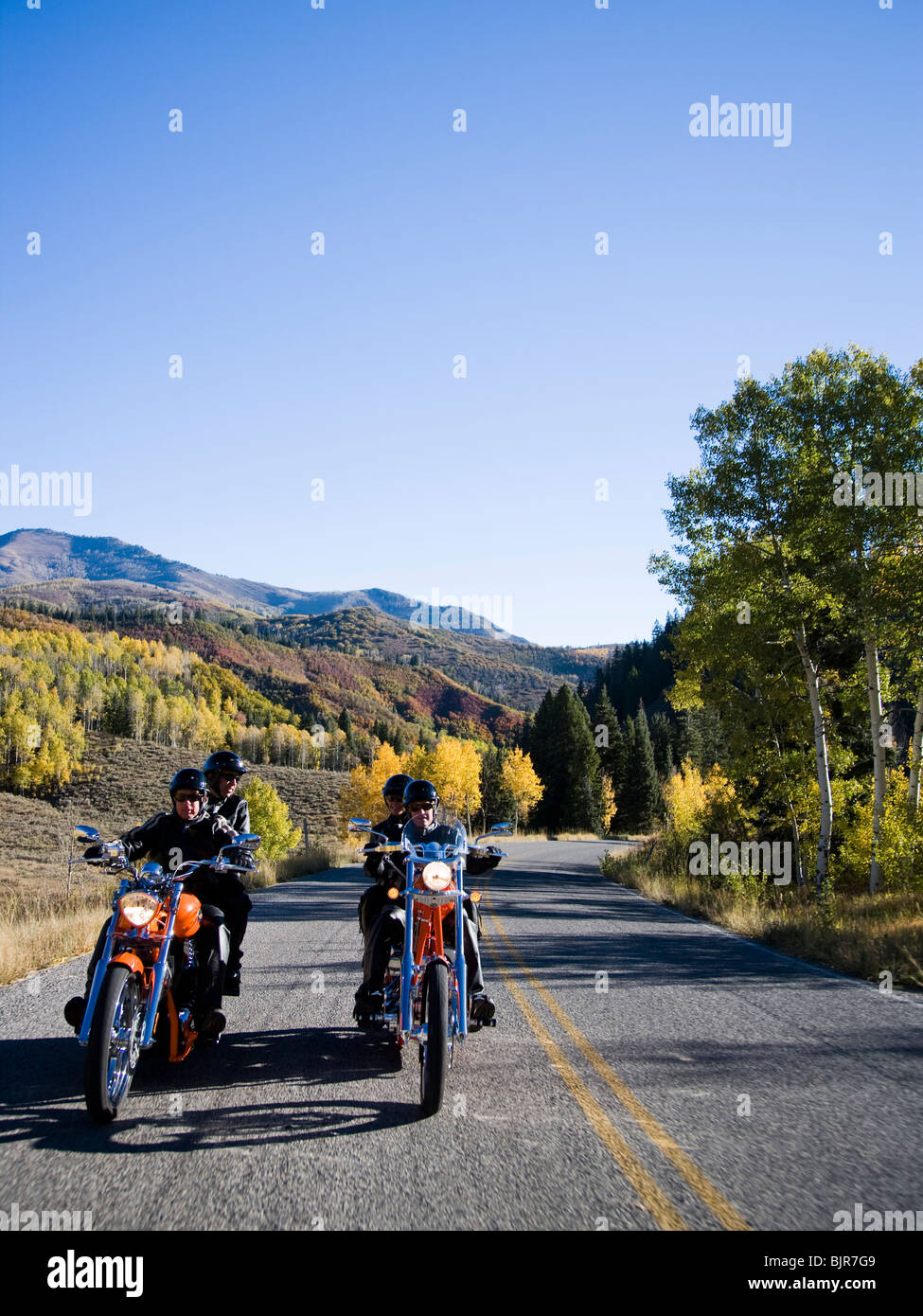 two couples on motorcycles Stock Photo - Alamy