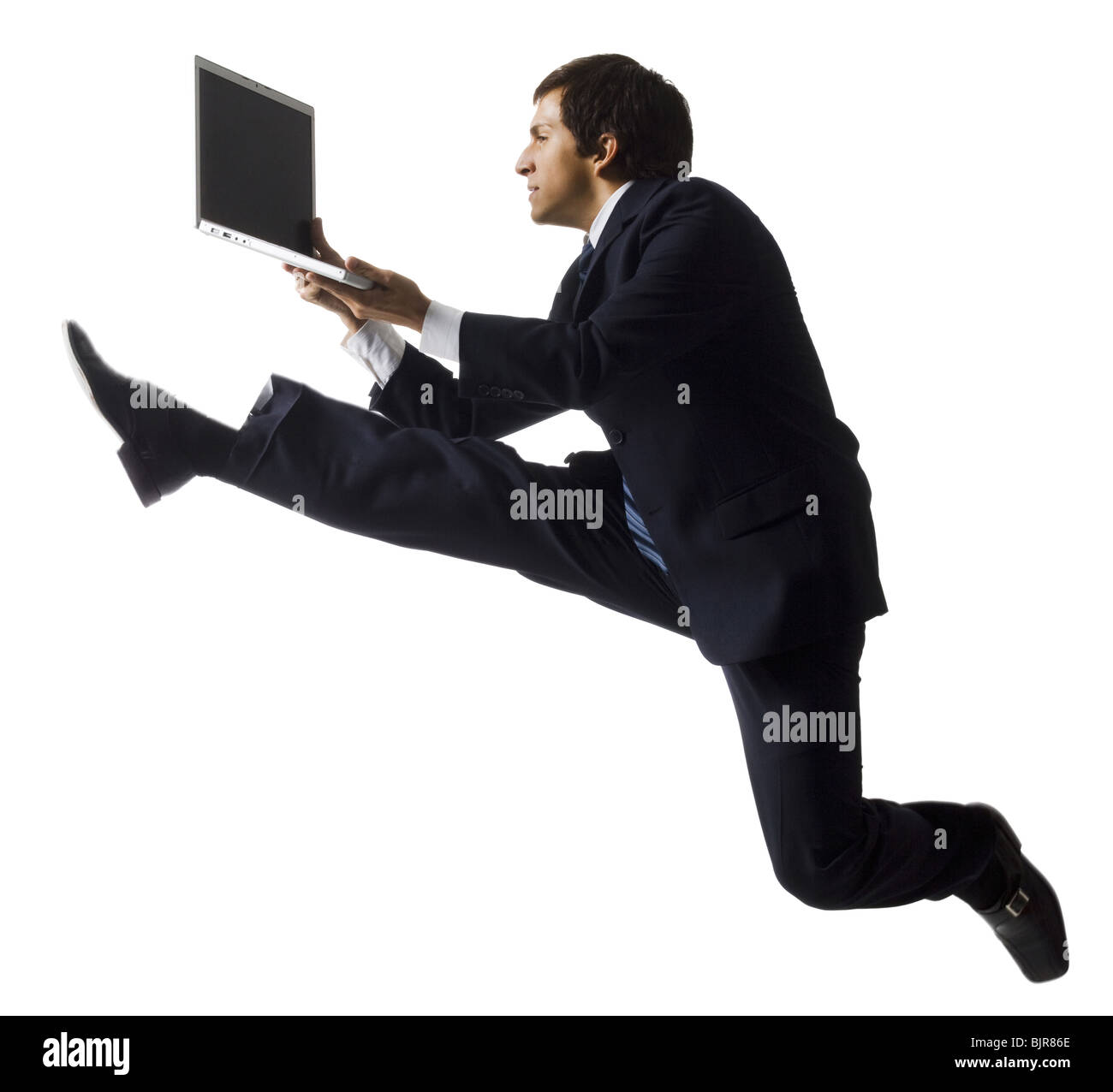 Man suit jumping laptop hi-res stock photography and images - Alamy