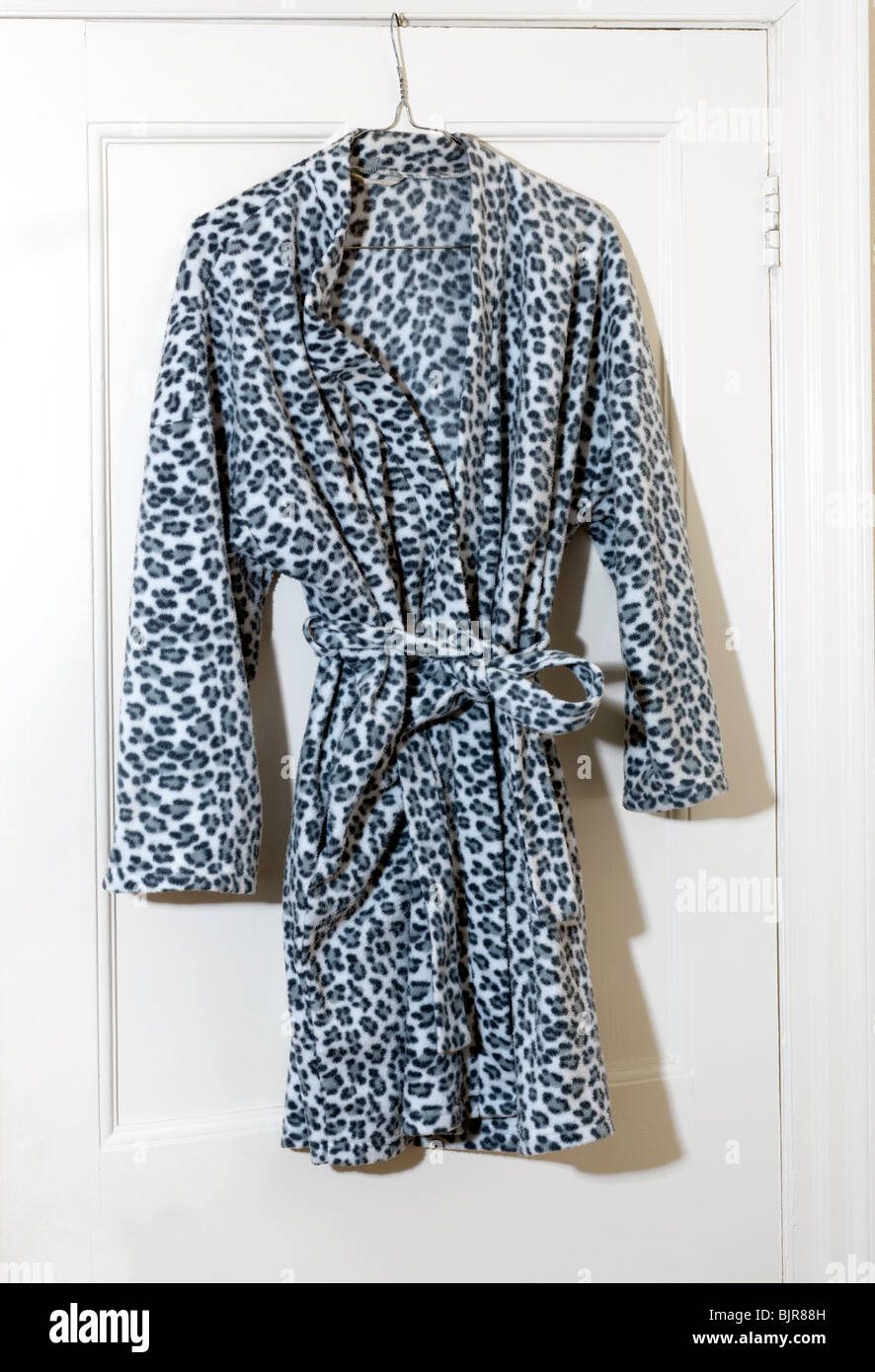 Leopard Print Dressing Gown Hanging On Back Of A Door Stock Photo - Alamy