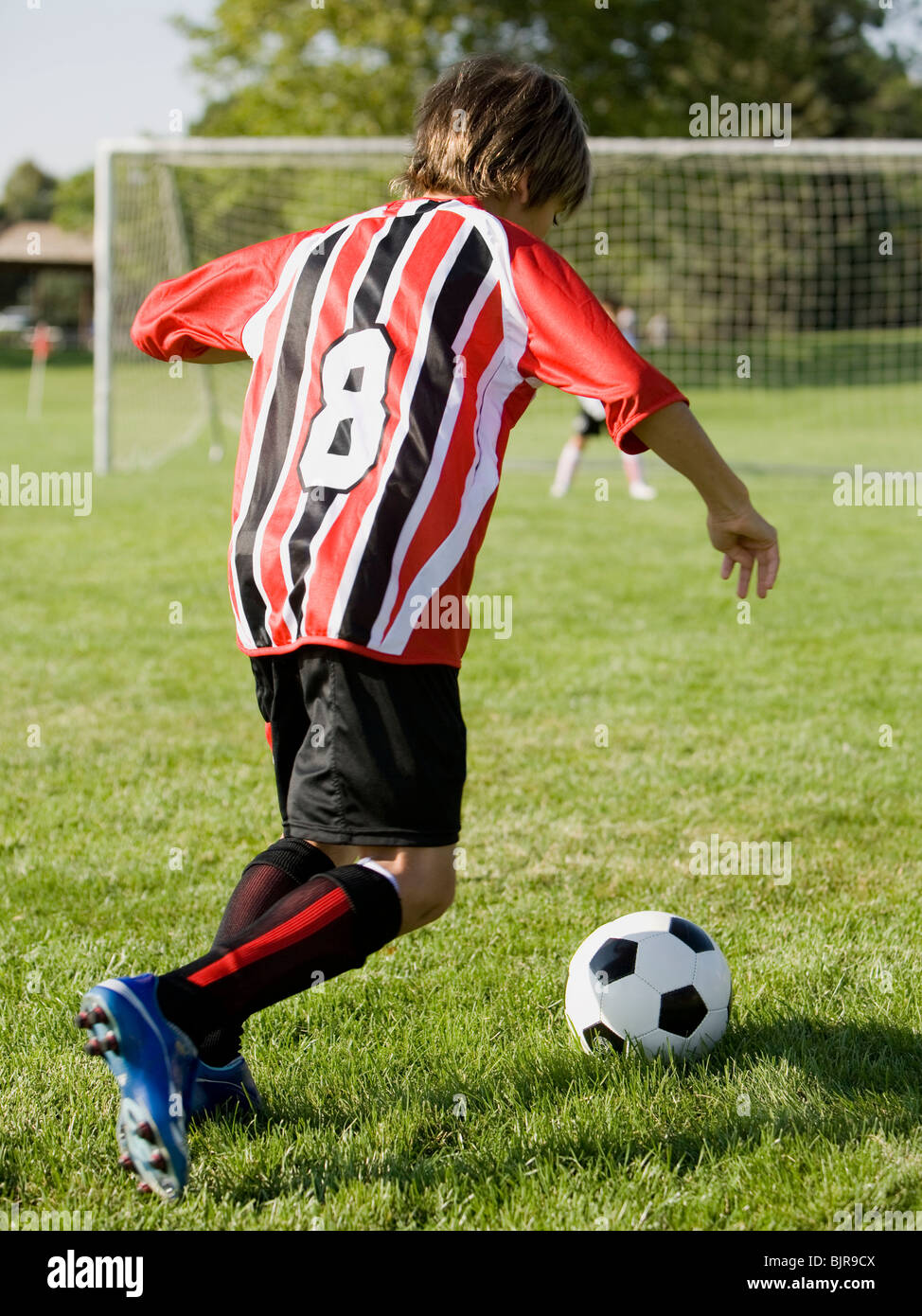 Soccer player from behind hi-res stock photography and images - Alamy