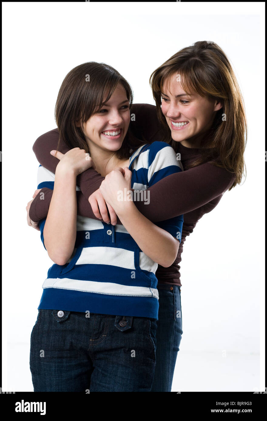 two woman looking at camera Stock Photo - Alamy