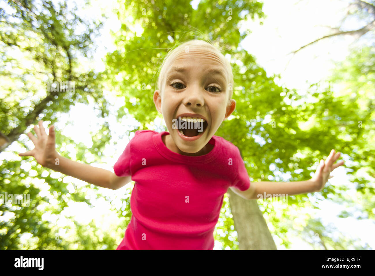 Girl smiling at camera Stock Photo - Alamy