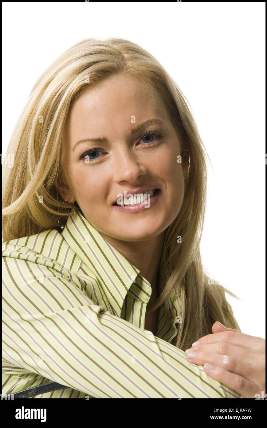 Woman posing and smiling Stock Photo - Alamy