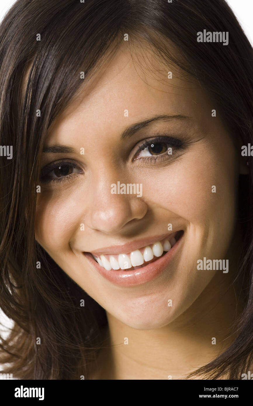 Woman posing and smiling Stock Photo - Alamy