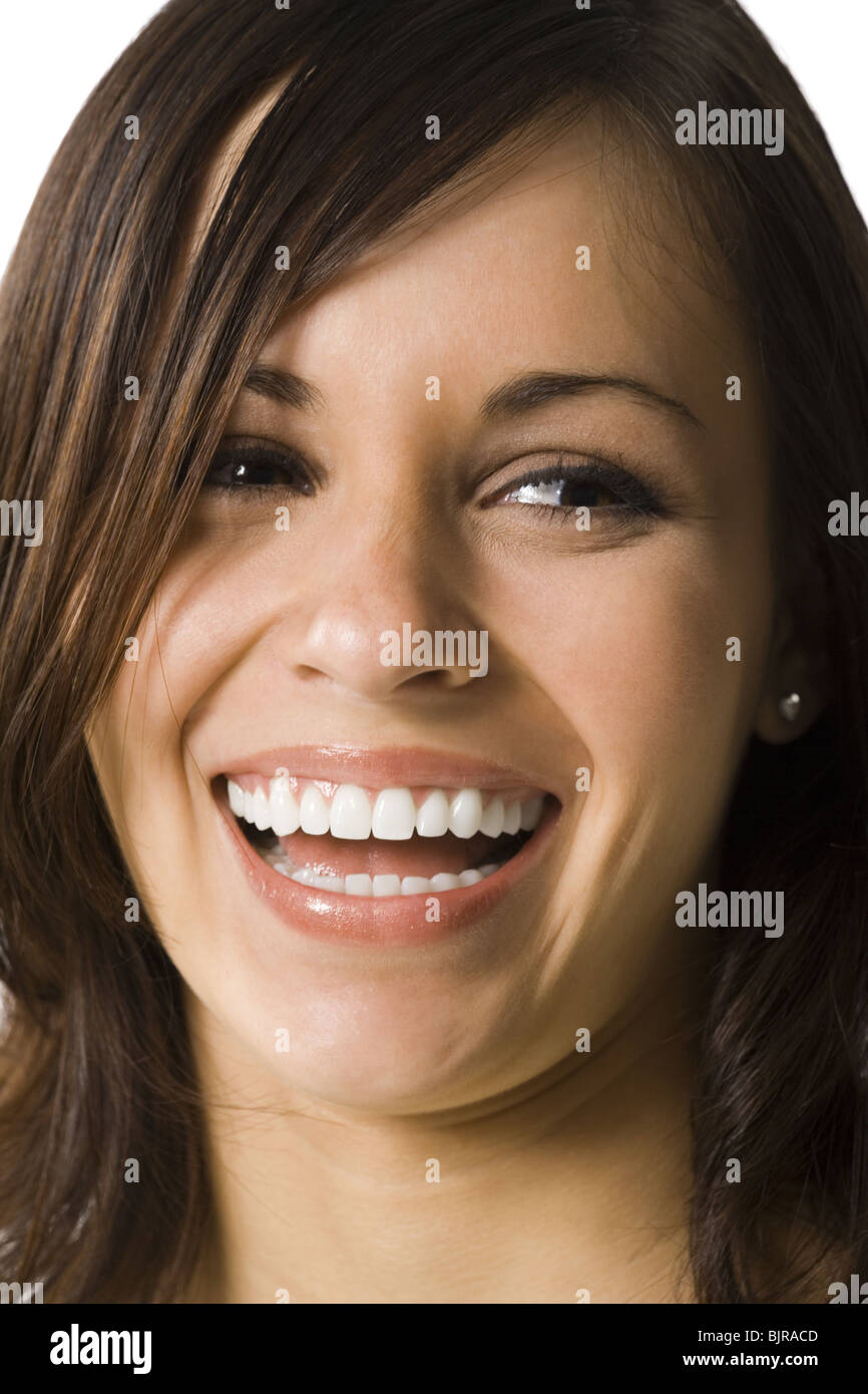Woman posing and smiling Stock Photo - Alamy