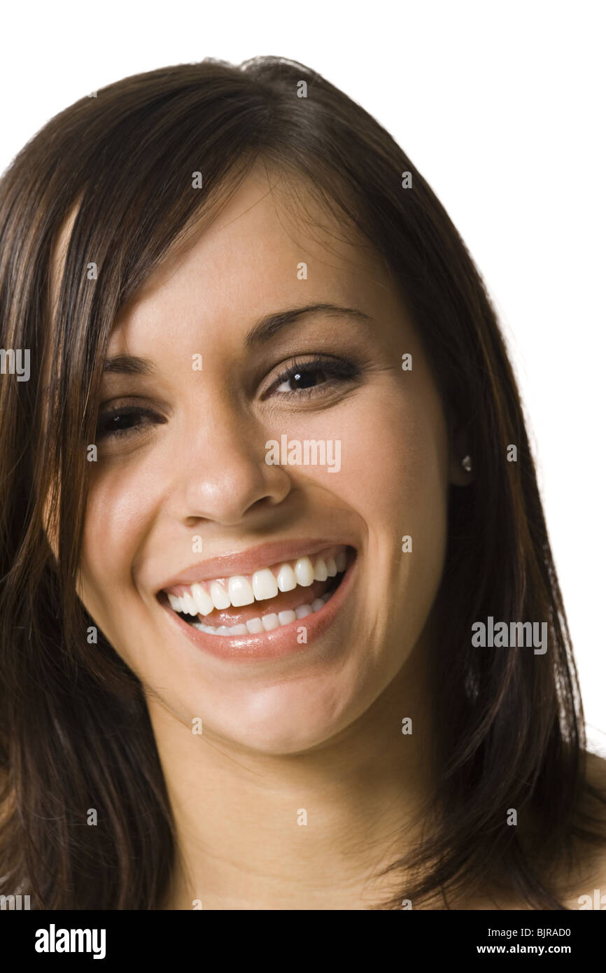Woman posing and smiling Stock Photo - Alamy