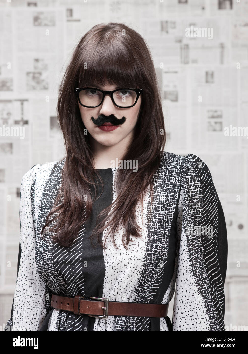 Woman wearing fake moustache hi-res stock photography and images - Alamy