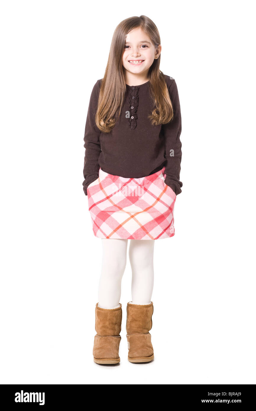 Studio portrait of girl (8-9) smiling Stock Photo - Alamy