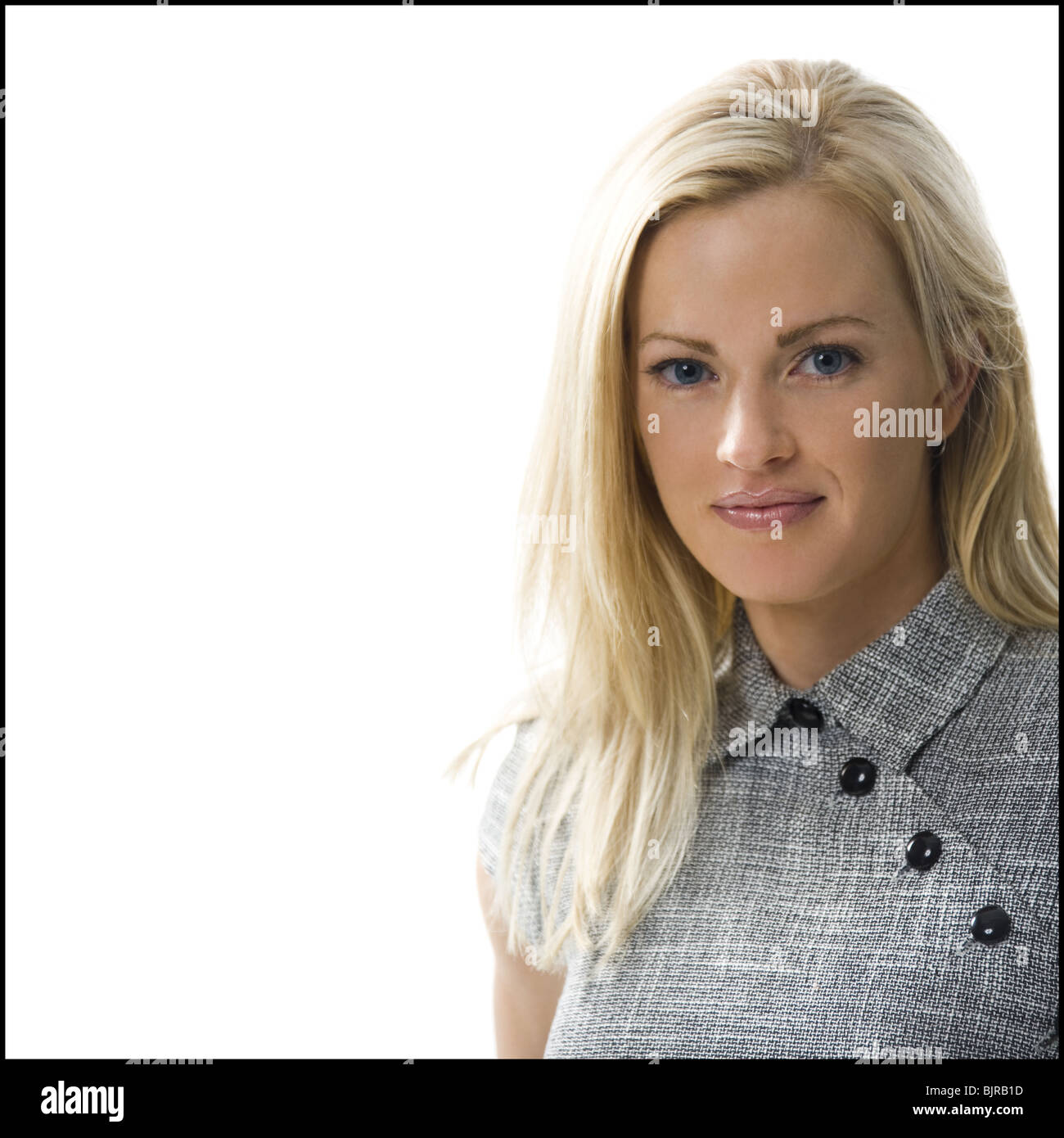 Woman posing and smiling Stock Photo - Alamy