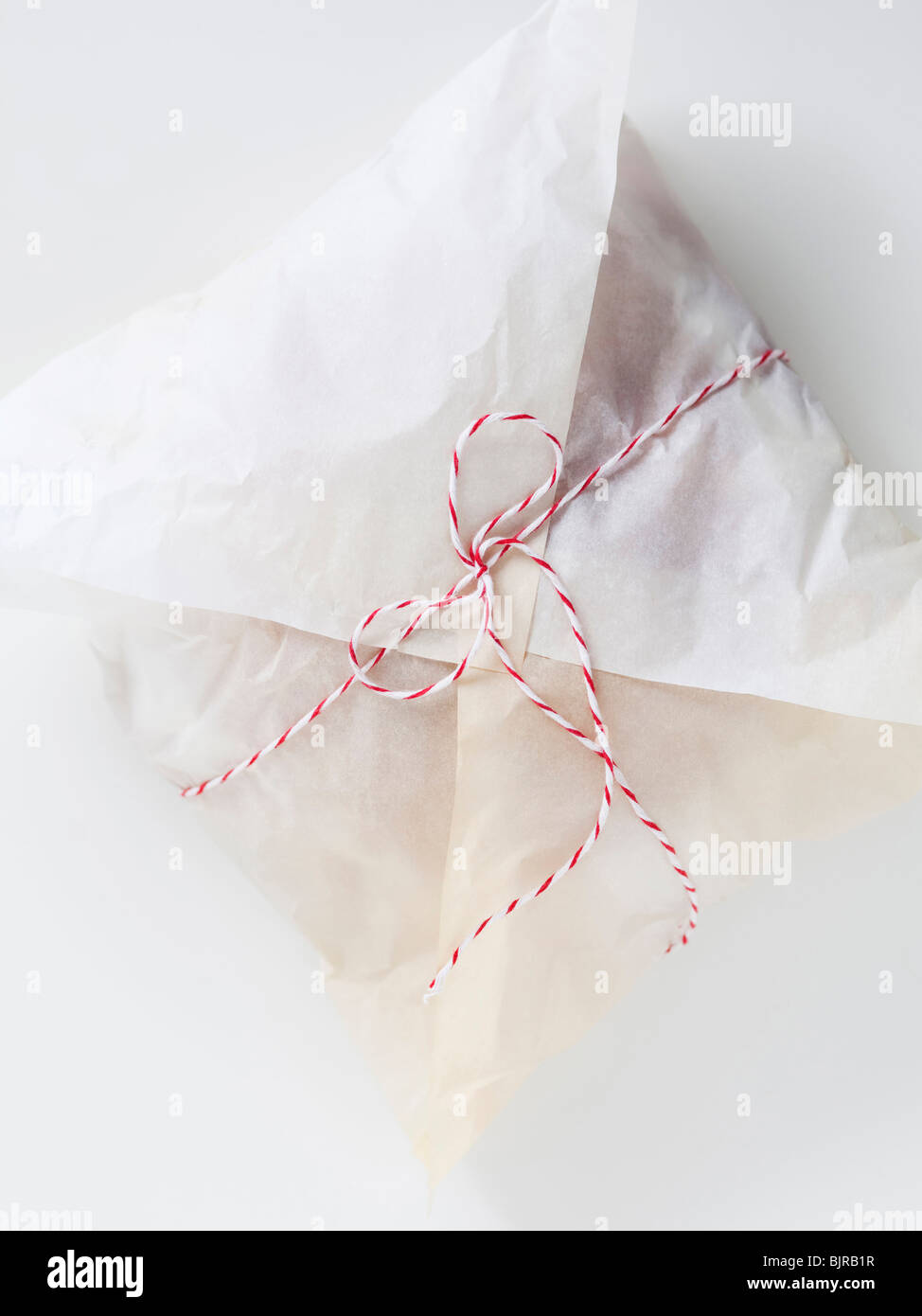 Bread wrapped in paper and tied up with string, view from above Stock ...