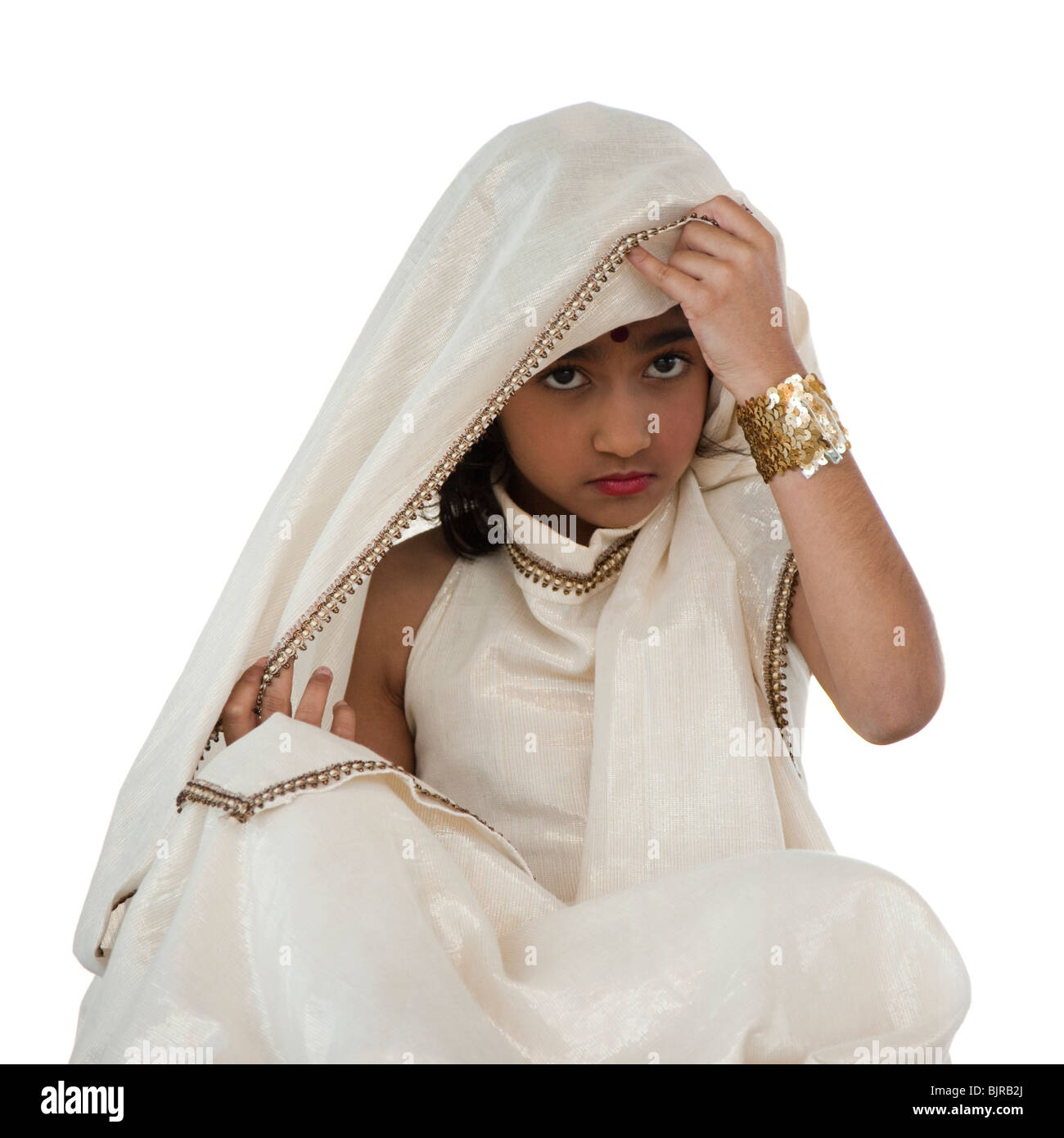 Girl (8-9) wearing traditional sari, portrait, studio-shot Stock Photo ...