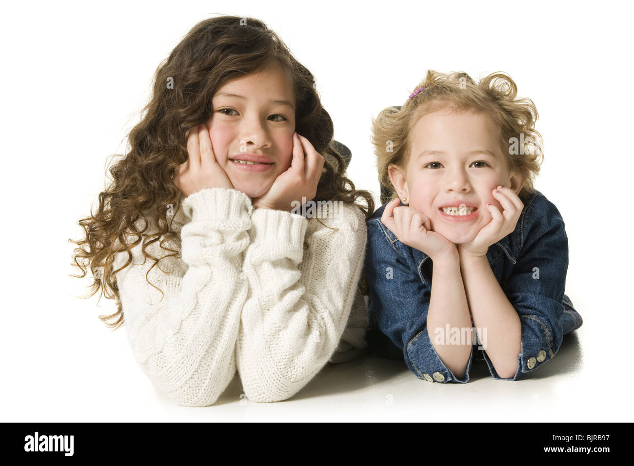 Asian sisters smiling Cut Out Stock Images & Pictures - Alamy