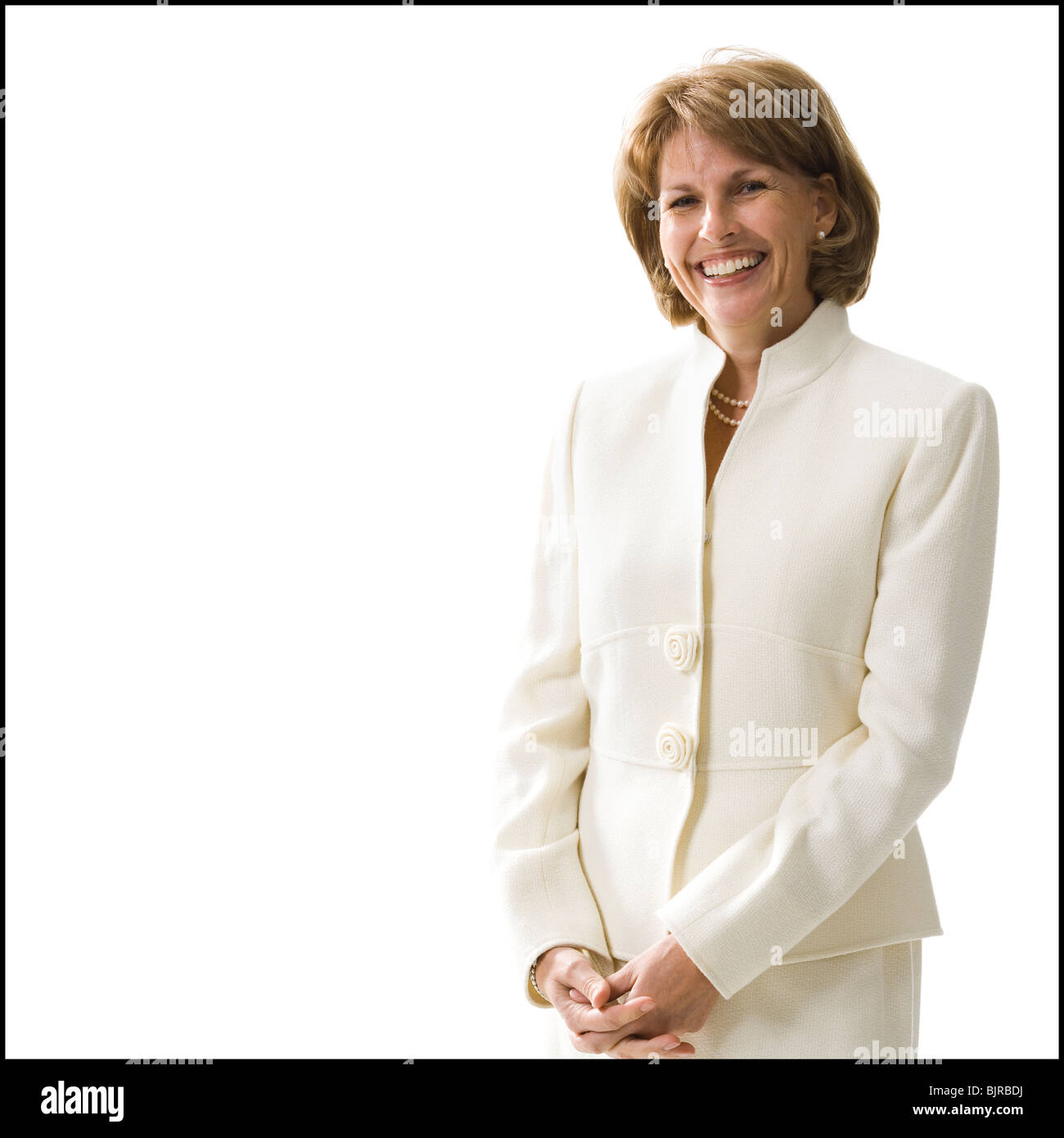 Woman posing and smiling Stock Photo - Alamy