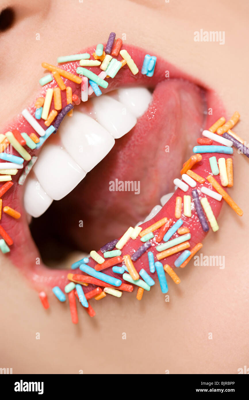 Woman licking her teeth hi-res stock photography and images - Alamy