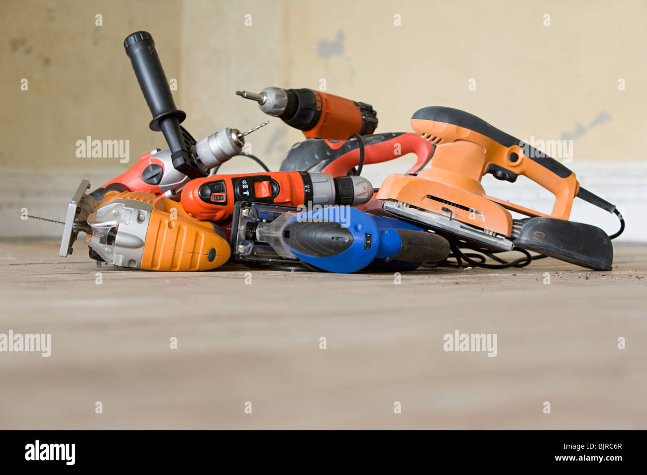 Pile of power tools Stock Photo - Alamy