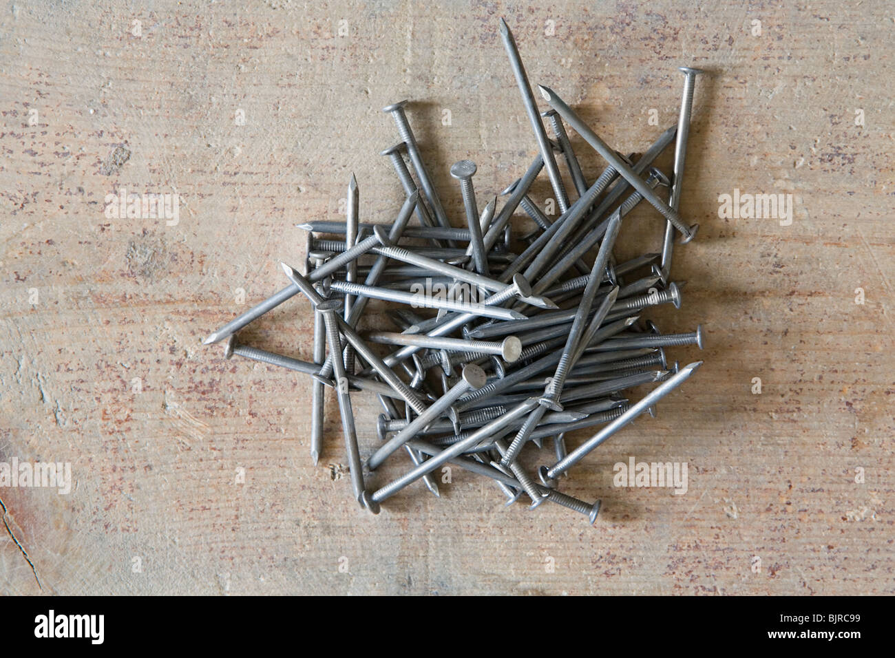 Pile of nails Stock Photo - Alamy