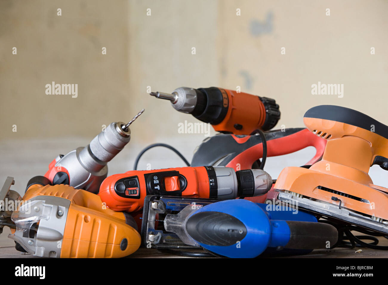 Pile of power tools Stock Photo - Alamy