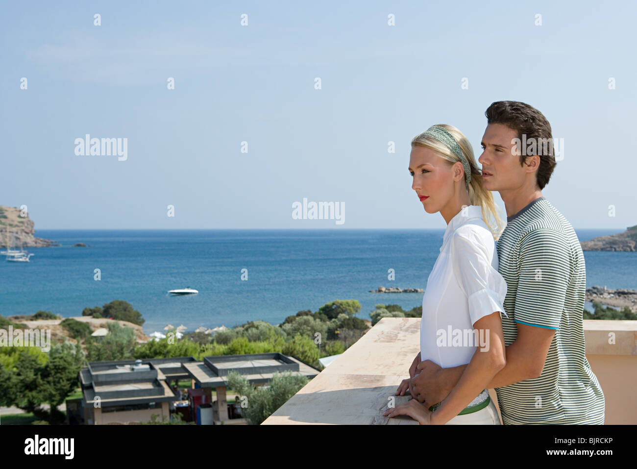 Couple looking at view Stock Photo - Alamy
